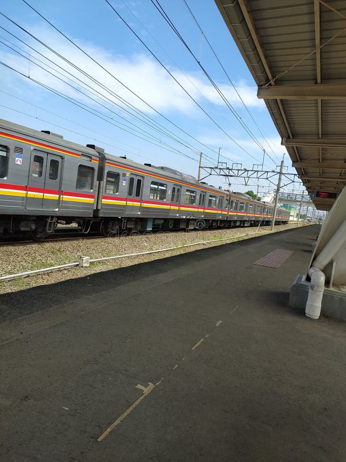 Electric Trains in Transit at the Station Editorial Stock Image - Image ...