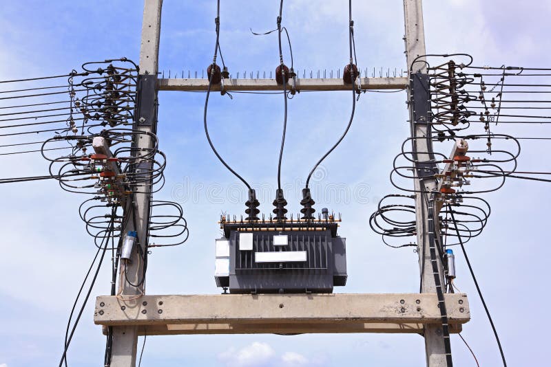 Electric Transformer in the Field Behind the Village, Wires and a Pole ...