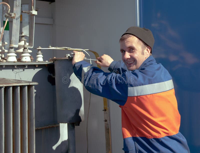 Electric Transformer Repairs Stock Photo - Image of male, electrician ...