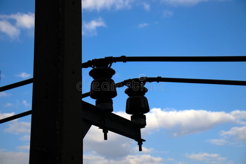 Electric Power Line at Pole Close-up. Silhouette with Blue Sky and ...