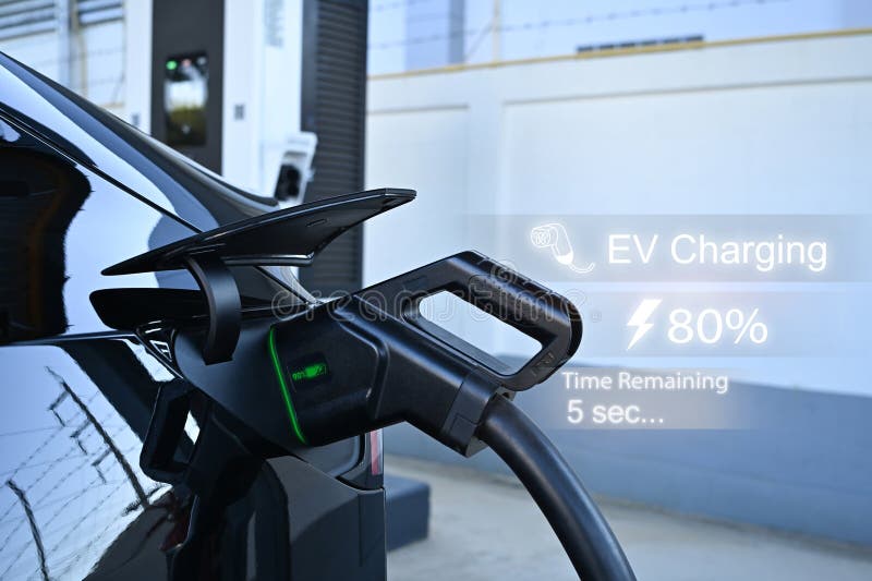 Electric Vehicle Charging at Station with Digital Interface Displaying ...