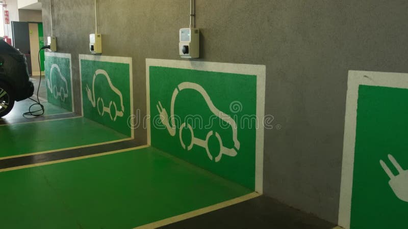Electric Vehicle Designated Parking Spot. Stock Video - Video of ...