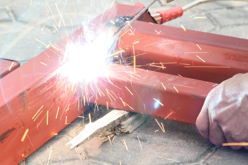 Electric welding stock image. Image of craftsman, pipe - 65721653