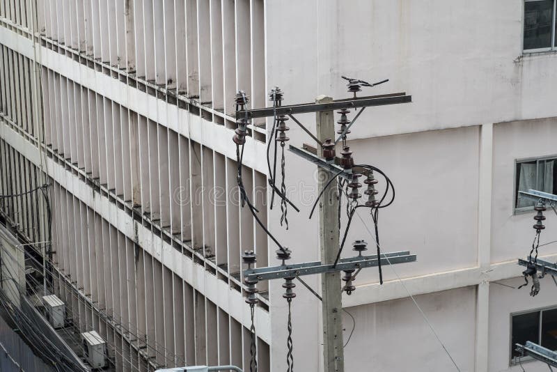 Electric Wire Post and Building Stock Image - Image of electric, wire ...