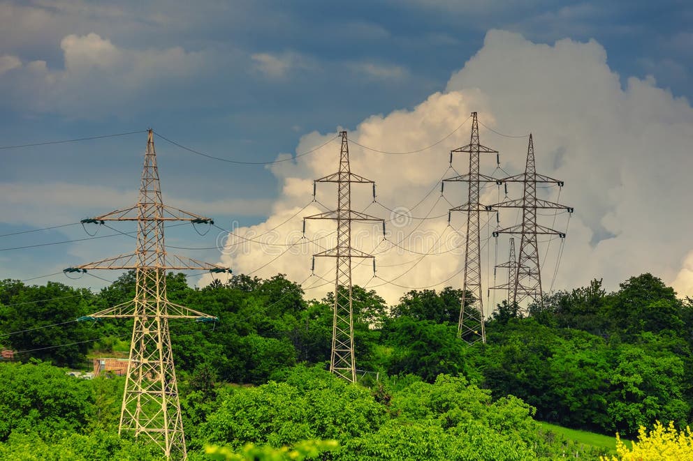 Electric Wire Pylons in Forest Stock Photo - Image of industrial, lines ...