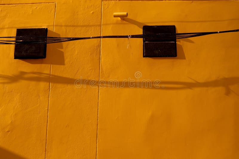 Electric Wire Shadow on Yellow Concrete Wall. Stock Photo - Image of ...