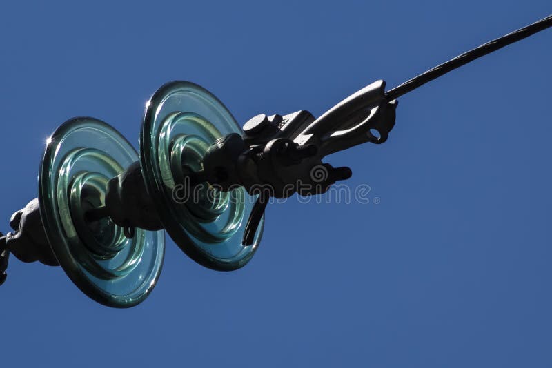 Electric Wires with Insulators are Stretched Out on Top on a Sky Stock ...