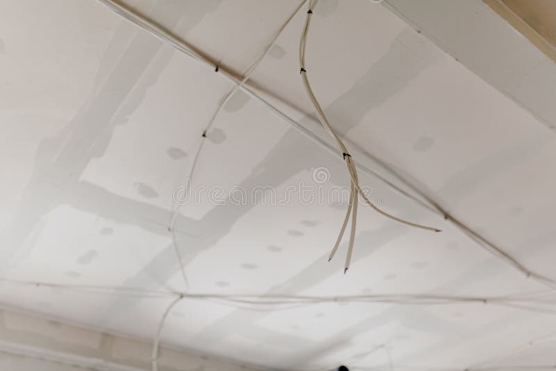 Electric Wires Network Mounted on Ceiling Stock Photo - Image of line ...
