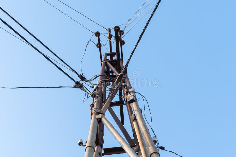 Electric wires on the pole stock photo. Image of close - 124999116