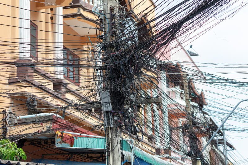 Electric Wires on Poles in the City Stock Photo - Image of tangled ...