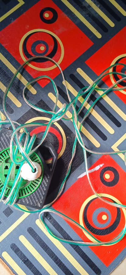 Electric Wires Tangled Under the Carpet in the House Stock Photo ...