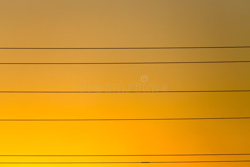Electric Wires on Yellow Sunset As Background Stock Photo - Image of ...