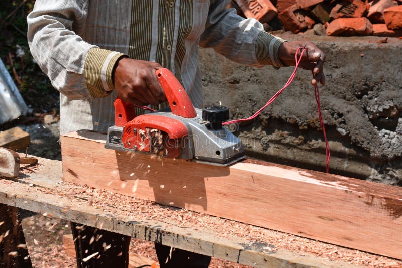 Electric Wood Planer Machine , Man at Work Stock Image - Image of ...
