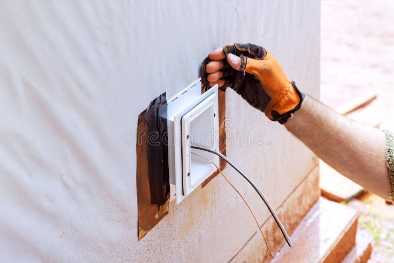 Electrical Box is Mounted on External Wall in a Deep Plastic Box that ...