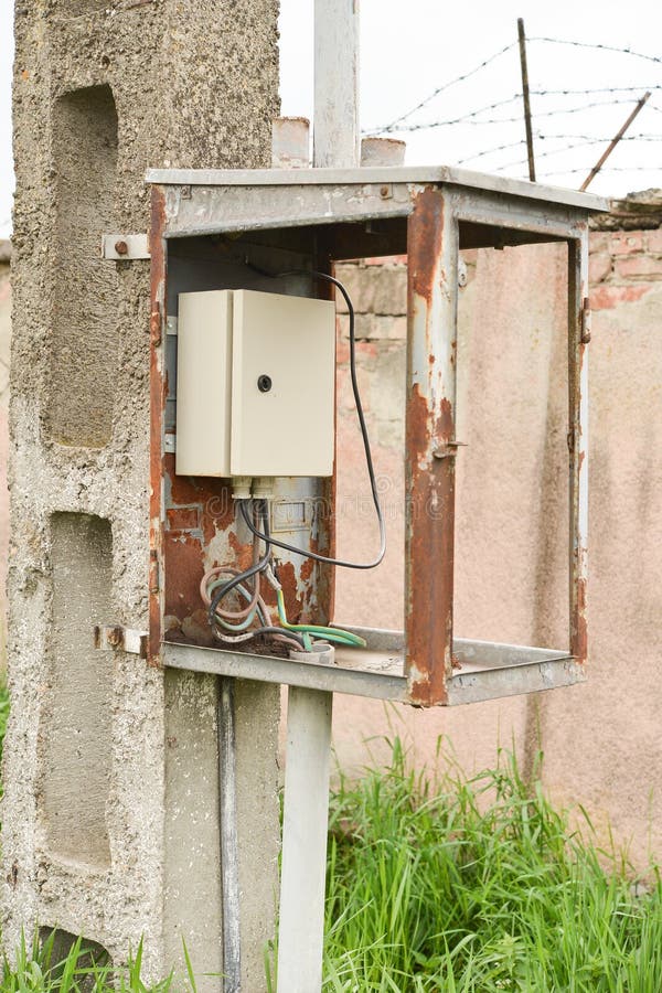 Electrical Box Placed in Old Metal Frame on a Pole Stock Photo - Image ...