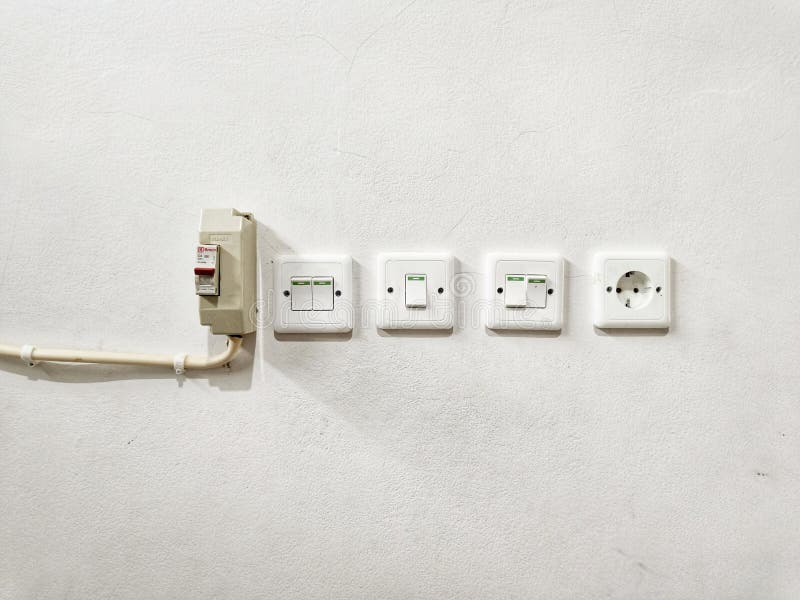 Wall-Mounted Electrical Breaker and Switch Panels on a Light Background ...