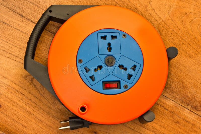 Electrical Cable Extension Reel on Wood Background Stock Image - Image ...