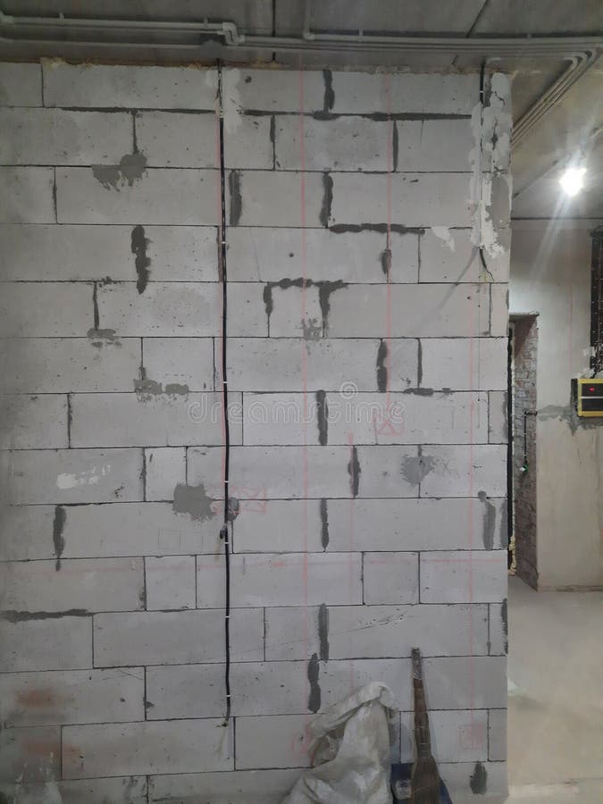 Electrical Cable Laying on a Foam Block Wall. Stock Image - Image of ...