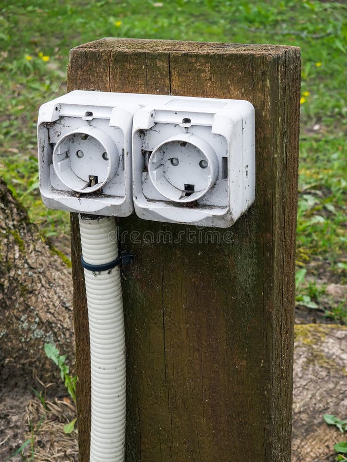 Electrical Cables with Plug Sockets in Park Stock Photo - Image of ...