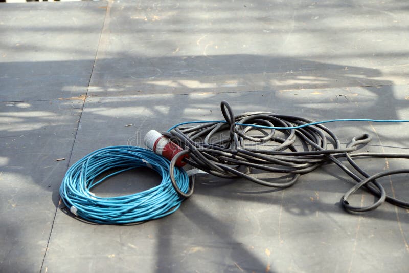 Electrical Cables Tangled on the Ground during an Outdoor Event Setup ...