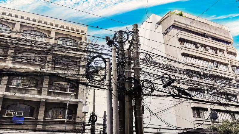 Electrical Cabling Spans between Utility Poles and Buildings ...