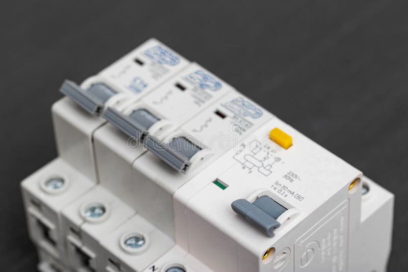 Electrical Circuit Breakers on a Gray Background, Close-up. Designed ...