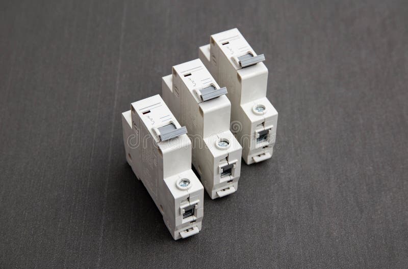 Electrical Circuit Breakers on a Gray Background, Close-up. Designed ...