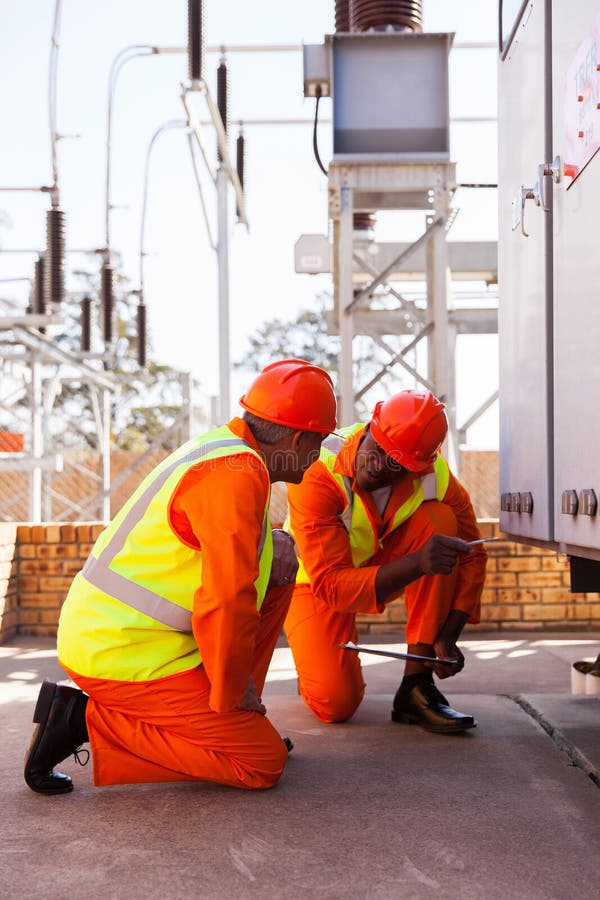 Electrical Co-workers Substation Stock Photo - Image of african ...