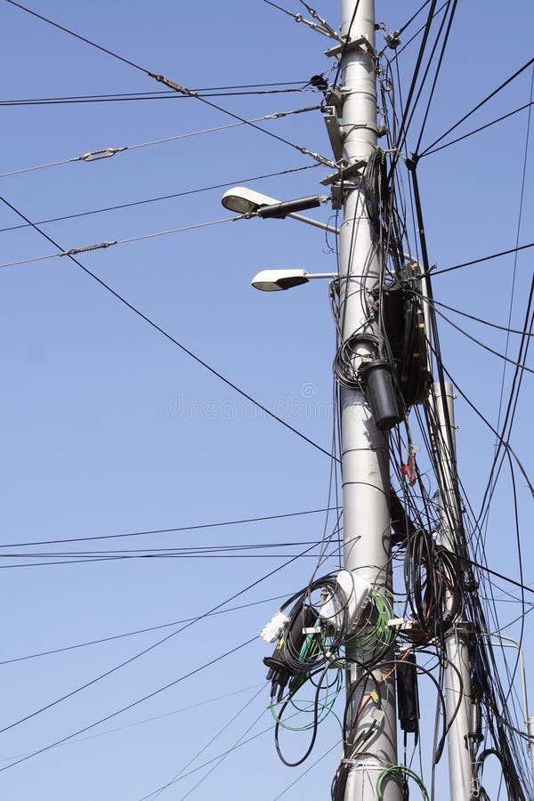 Electrical and Communication Pole Stock Image - Image of complex, mess ...