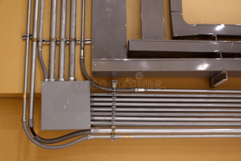 Electrical Conduits System and Metal Pipeline Installed on Building ...