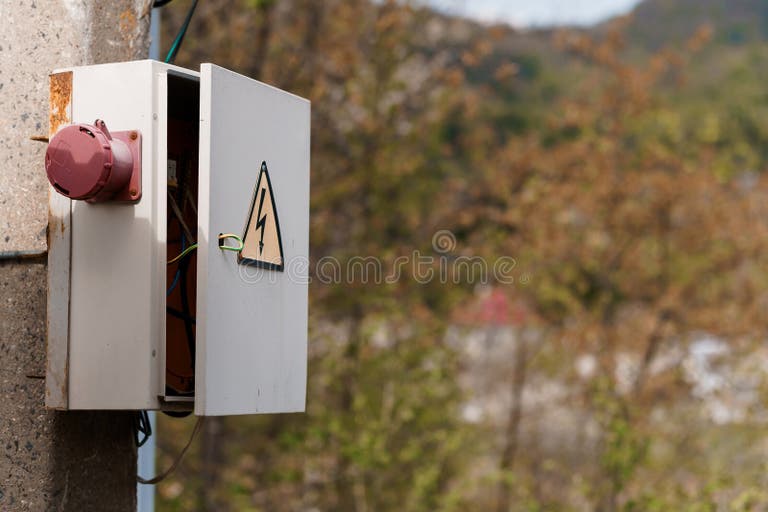 Electrical Control Box with Warning Sign in a Natural Setting Stock ...