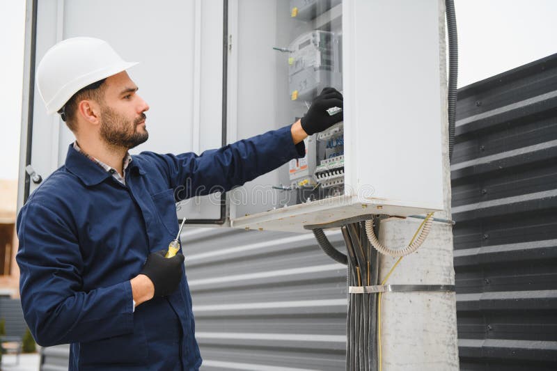 Electrical Engineer Approving Power Distribution Box Installation on ...