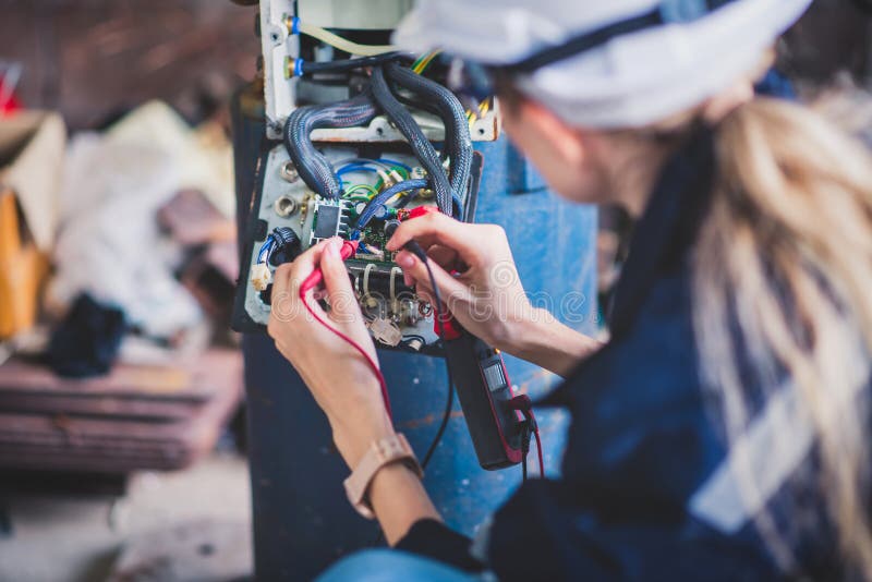 Electrical Engineer Checking Power Distribution Cabinet in the Control ...
