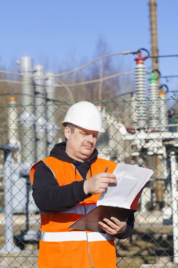 Electrical Engineer with Documentation Stock Photo - Image of checking ...