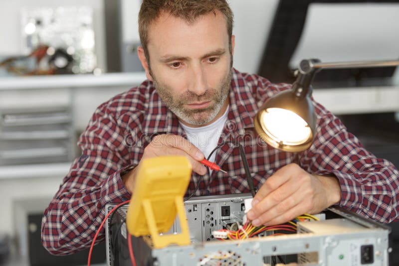 Electrical Engineer Fixing Motherboard Problem Stock Image - Image of ...