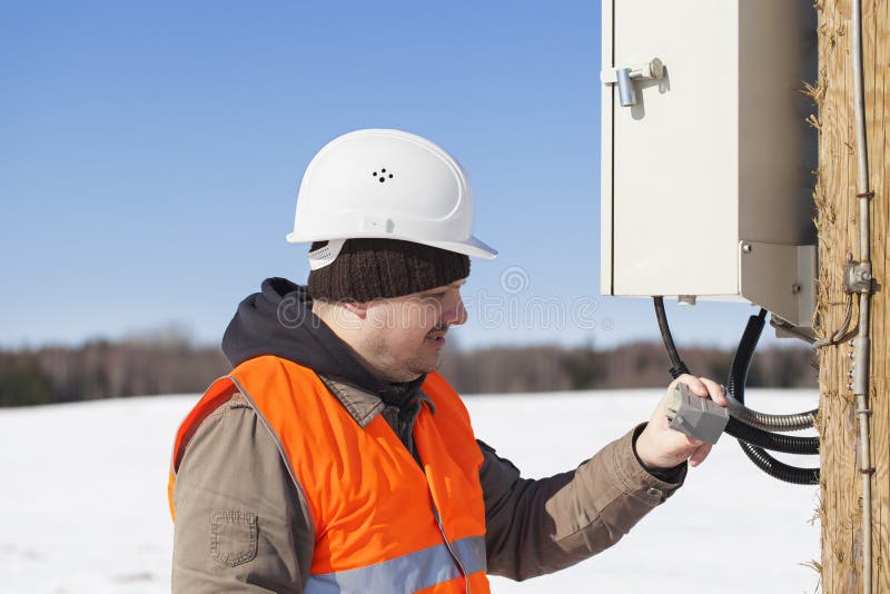 Electrical Engineer Inspect Electric Lines Stock Image - Image of cute ...