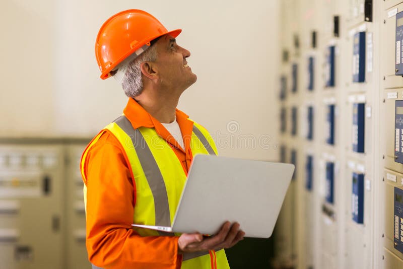 Electrical engineer laptop stock photo. Image of male - 43815930