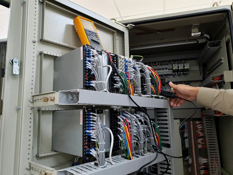 The Electrical Engineer Checking the Electrical Current Measurement at ...
