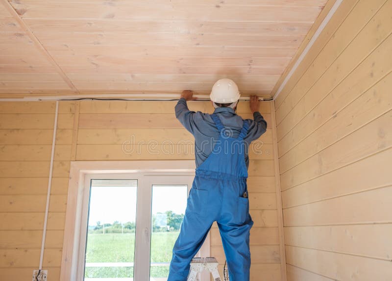 Electrical Engineer Performs Installation of Electrical Wiring Stock ...