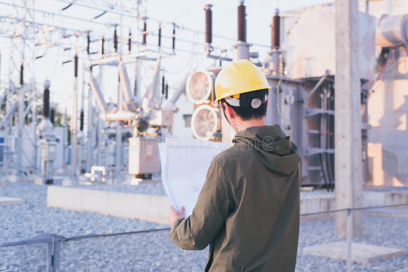 Electrical Engineer Standing at the Power Substation Stock Image ...