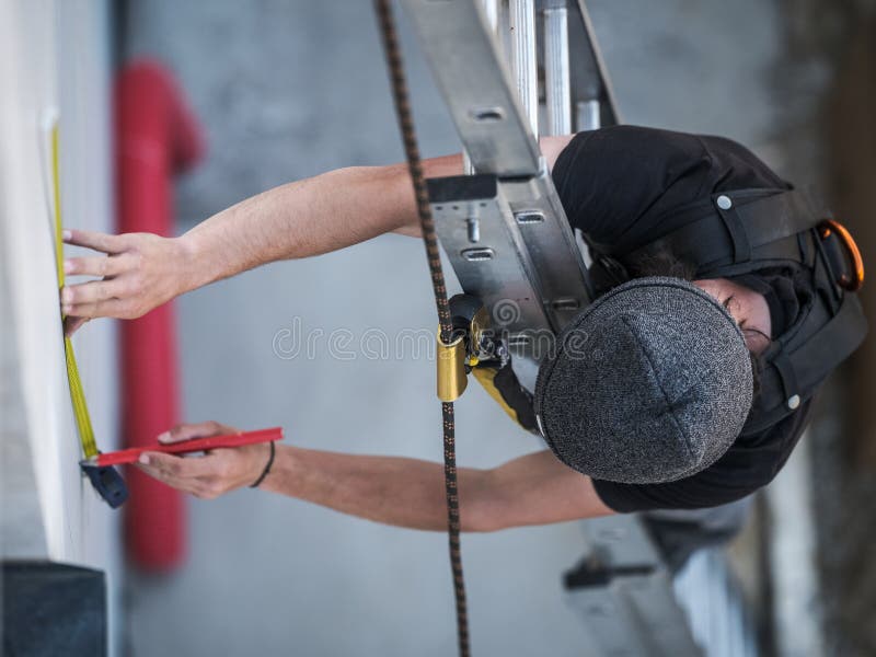 An Electrical Engineer of the Team Installs the Electrical Cables for ...