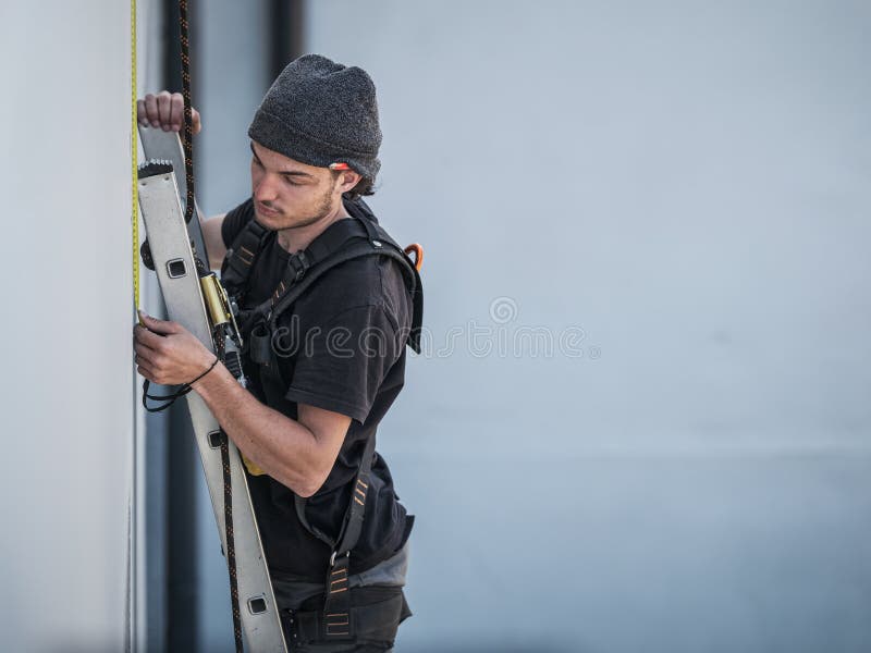An Electrical Engineer of the Team Installs the Electrical Cables for ...