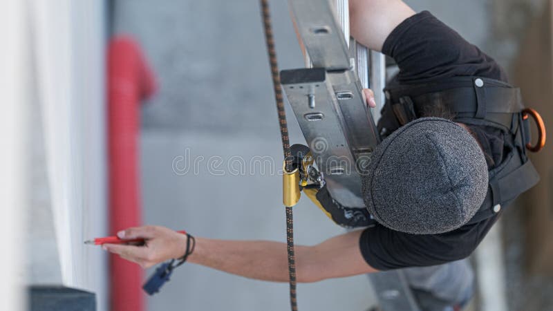 An Electrical Engineer of the Team Installs the Electrical Cables for ...