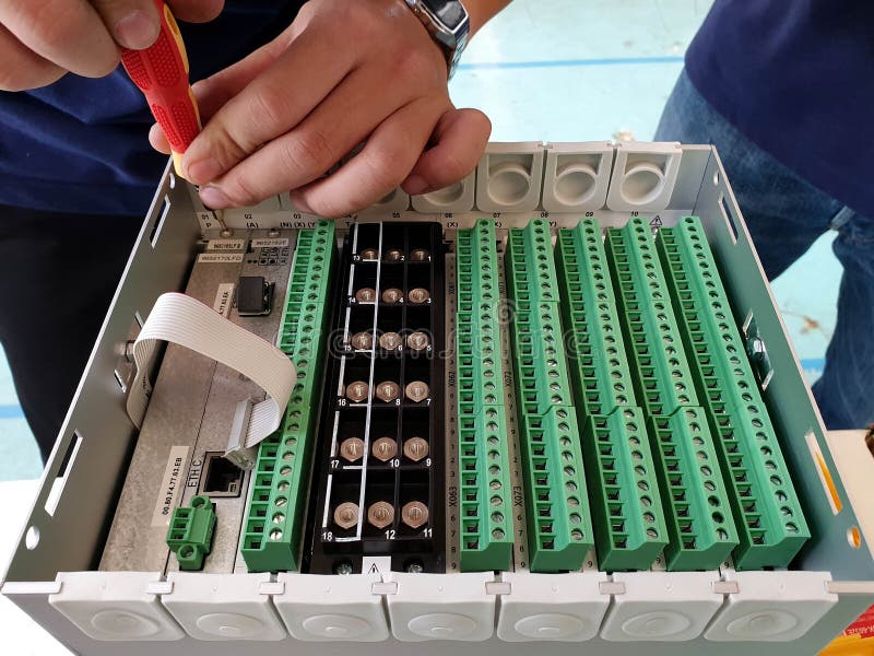 The Electrical Engineer Used the Screwdriver To Remove the Protection ...