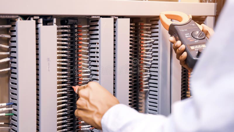 Electrical Engineer Using Digital Multi-meter is Measuring Equipment To ...