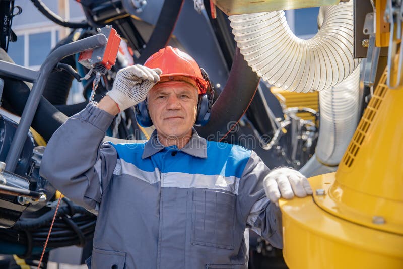 Electrical Engineer Worker Maintains Mining Equipment for Lowering into ...
