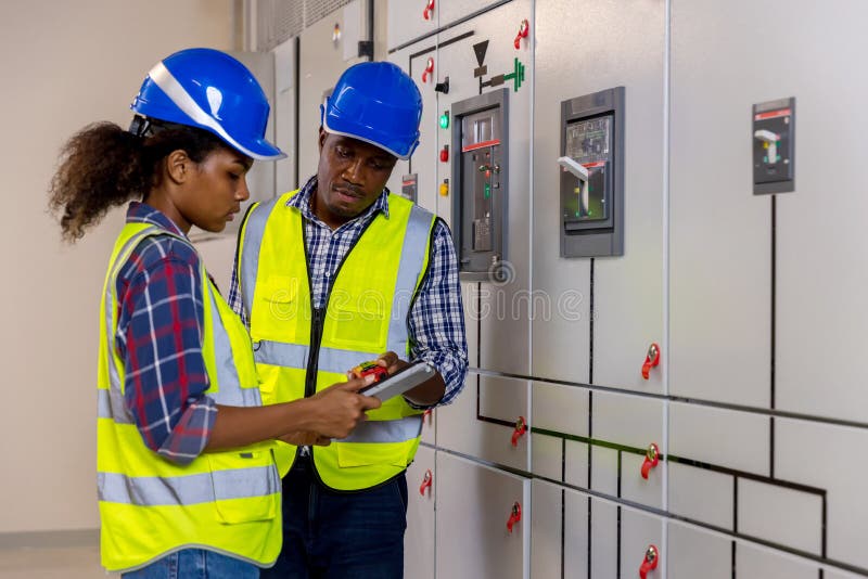 Electrical Engineer Working in Control Room. Electrical Engineer Man ...