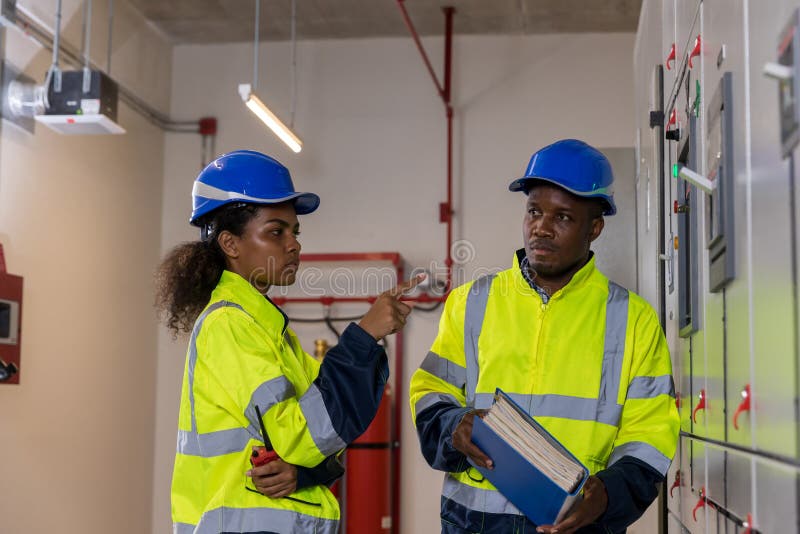 Electrical Engineer Working in Control Room. Electrical Engineer Man ...