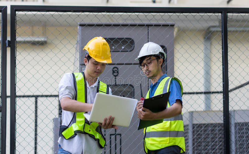 Electrical Engineer Working in Control Room. Electrical Engineer Man ...