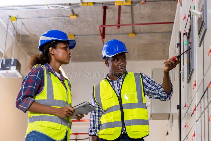 Electrical Engineer Working in Control Room. Electrical Engineer Man ...